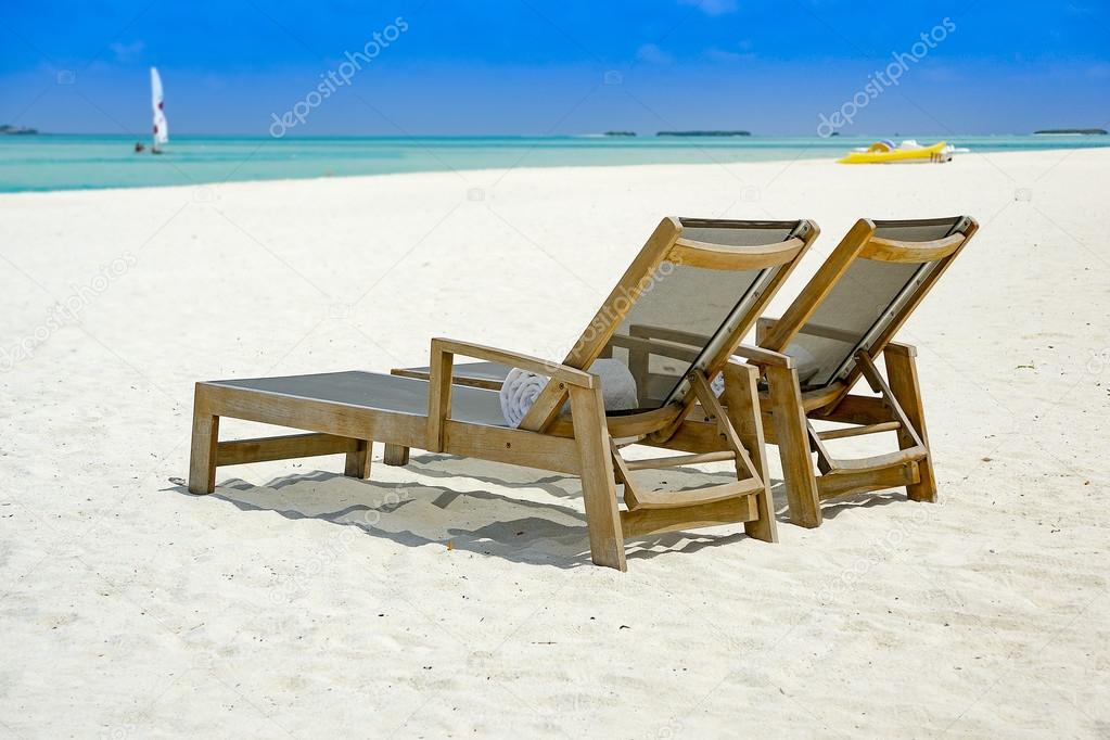 Two beach chairs at ocean front — Stock Photo © beachboy #95338256