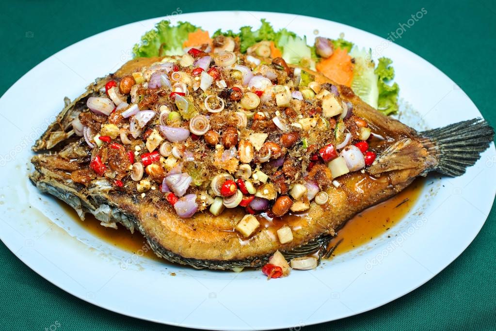 Deep Fried Fish with Thai Herb — Stock Photo © yuri2011 #81664616