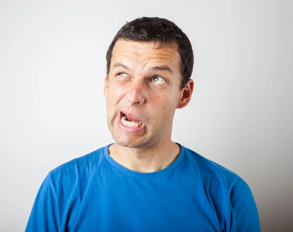 Composition of young man expressing different emotions Stock Photo by ...