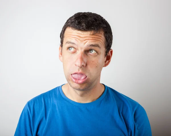 Young man expressing emotions Stock Photo by ©semisatch 78370128