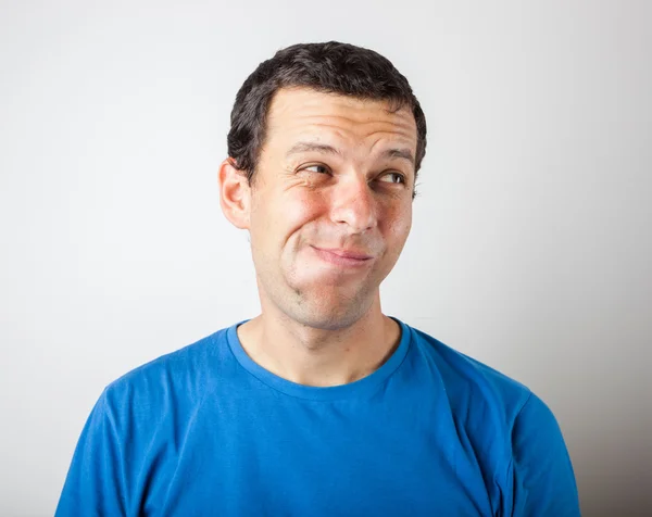 Young man expressing emotions Stock Photo by ©semisatch 78370128