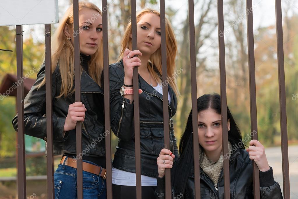 Girls behind bars — Stock Photo © muro #58220053