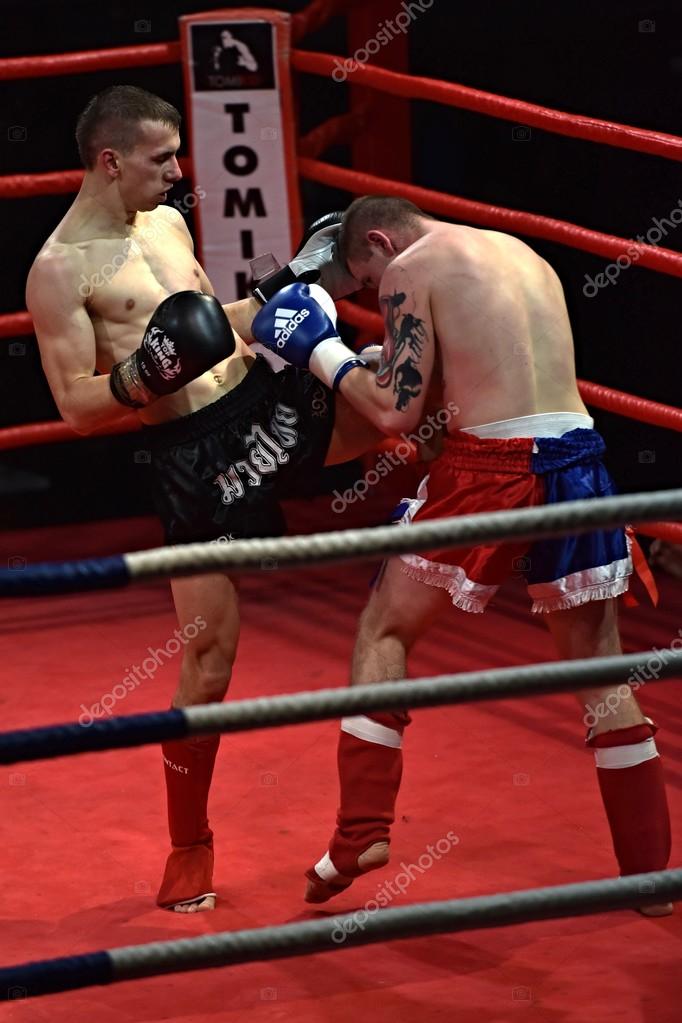 Strong fighter and his opponent during a fight in a ring Combat Fight ...