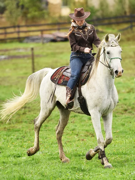 Girl barrel racing Stock Photo by ©muro 86068656