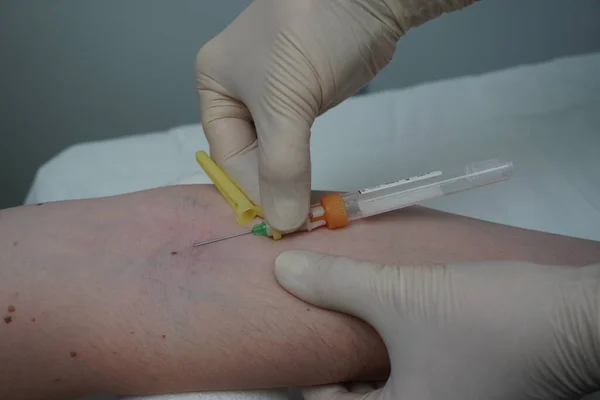 Patient with needle Stock Photos, Royalty Free Patient with needle ...