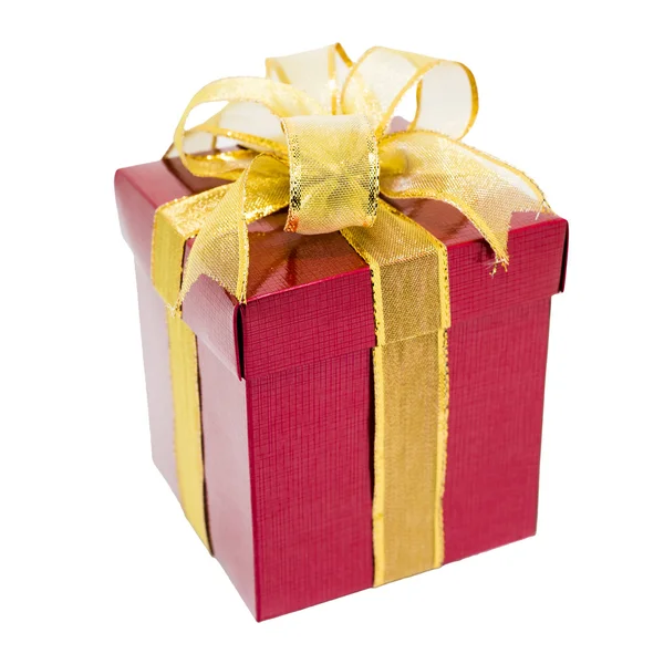 Beautiful gold present box with red bow and ribbons Stock Photo by ...