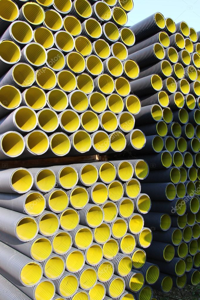 Yellow corrugated pipes for laying electric cables and optical f Stock ...