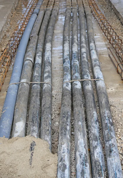 Underground pipes corrugated for optical fiber and power cables - Stock ...