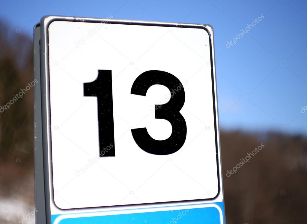 Number 13 in a road sign in mountain — Stock Photo © ChiccoDodiFC #62982259