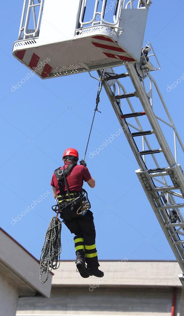 Firefighter hung the rope climbing — Stock Photo © ChiccoDodiFC #73916559