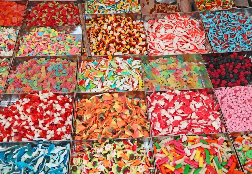 Many sugary candy and chewy for sale in candy stall in the local Stock ...