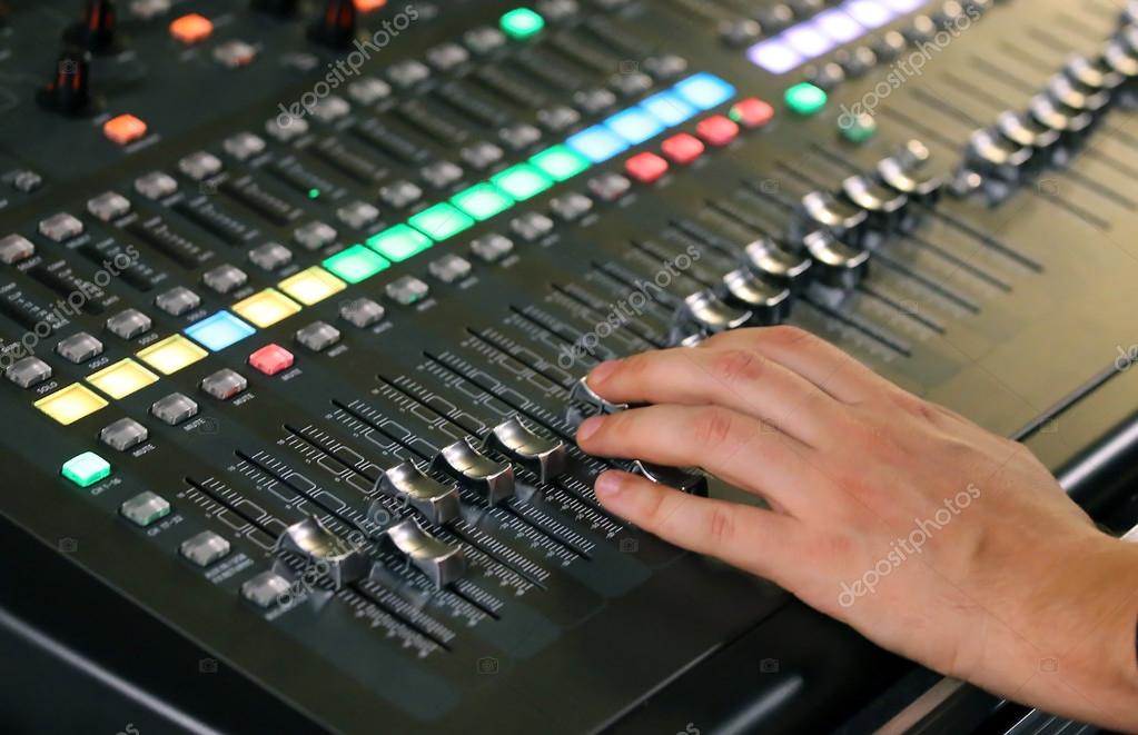 Big mixing console with channel to change volume and bass and tr ...
