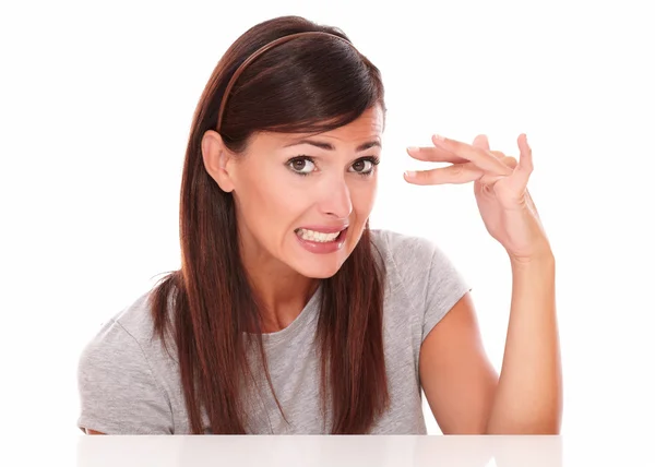 Embarrassed young woman with fail gesture Stock Photo by ©pablocalvog ...