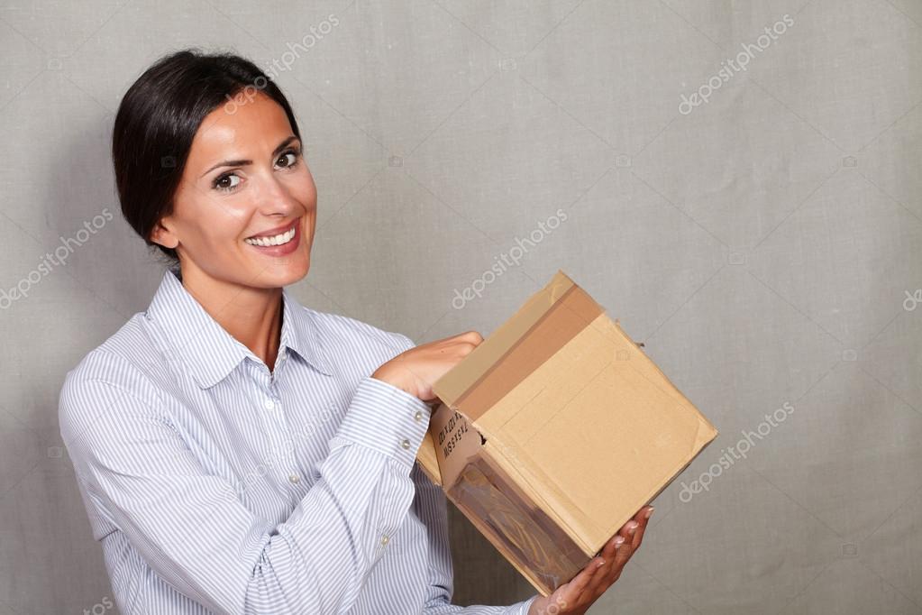 Business woman opening box — Stock Photo © pablocalvog #93851444