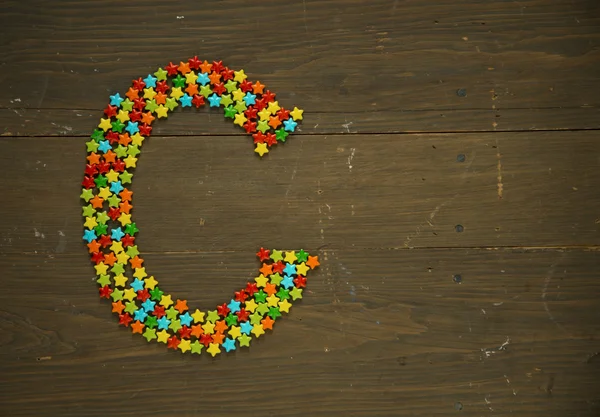 Letter S made with candy — Stock Photo © pinkcandy #101071562