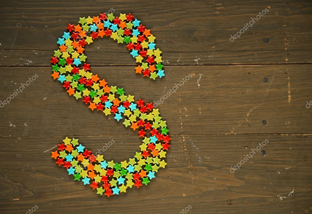 Letter S made with candy — Stock Photo © pinkcandy #101071562