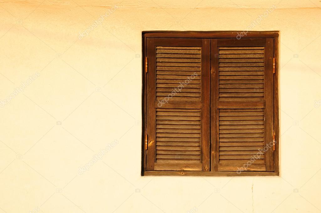 Window with wooden shutters. Stock Photo by ©voddol 70036855