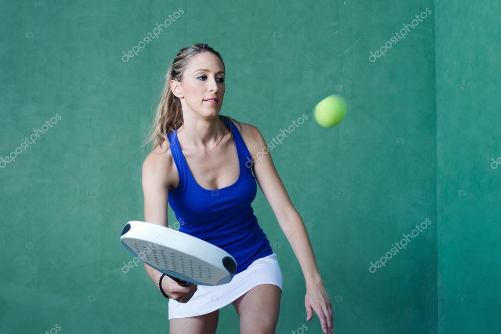 Woman playing paddle holding racket. sportswoman. Stock Photo by ...