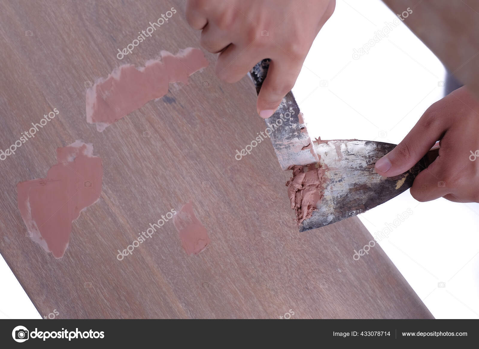 Young Carpenter Work Clothes Using Scraper Wood Filler Finishing Work ...