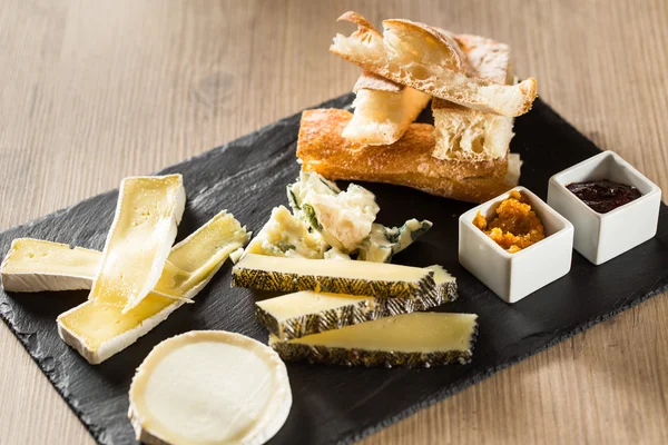 Fine dining cheese plate — Stock Photo © vision.si #111903616