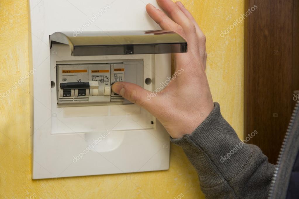 Male hand using an electronic control panel — Stock Photo © artofphoto ...