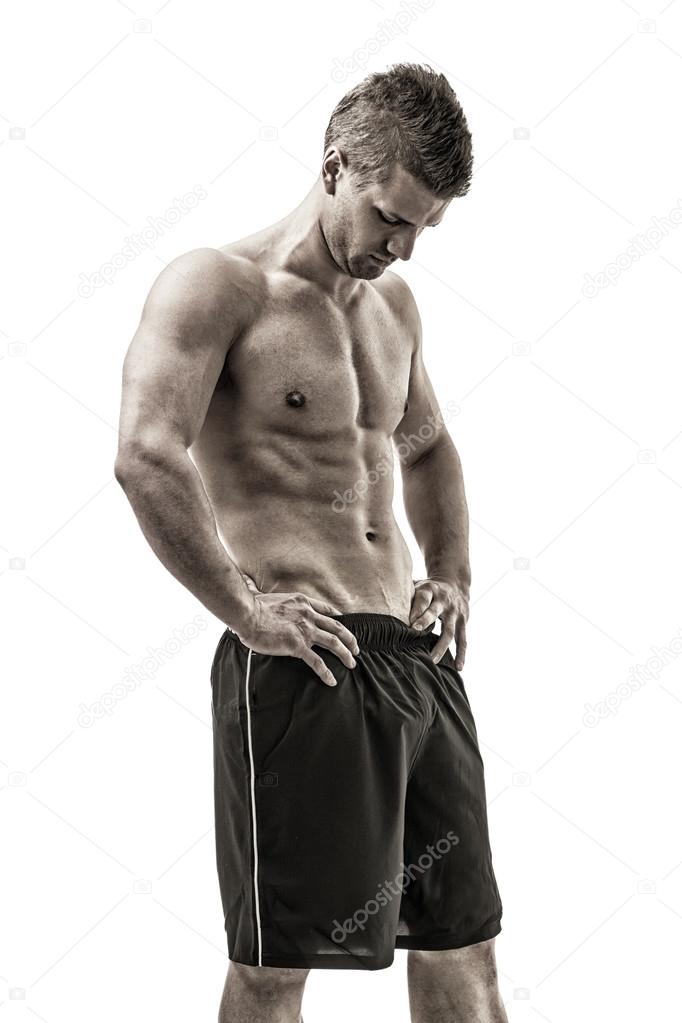 Handsome young bodybuilder in relaxed pose Stock Photo by ©artofphoto ...