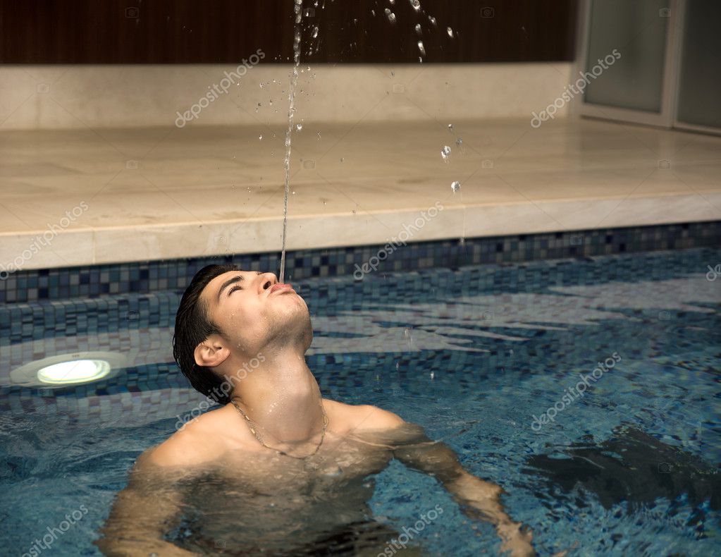 Young Man Playing in Swimming Pool, Spitting Water — Stock Photo ...