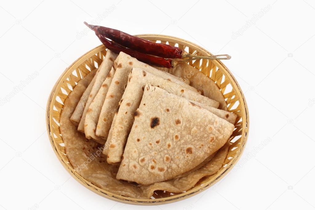 Roti Paratha isolated on white. Indian Bread in wooden Basket Stock ...