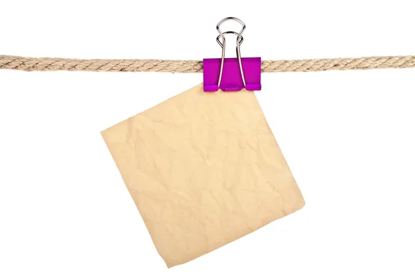 Vintage paper on a rope isolated on white background closeup Stock ...