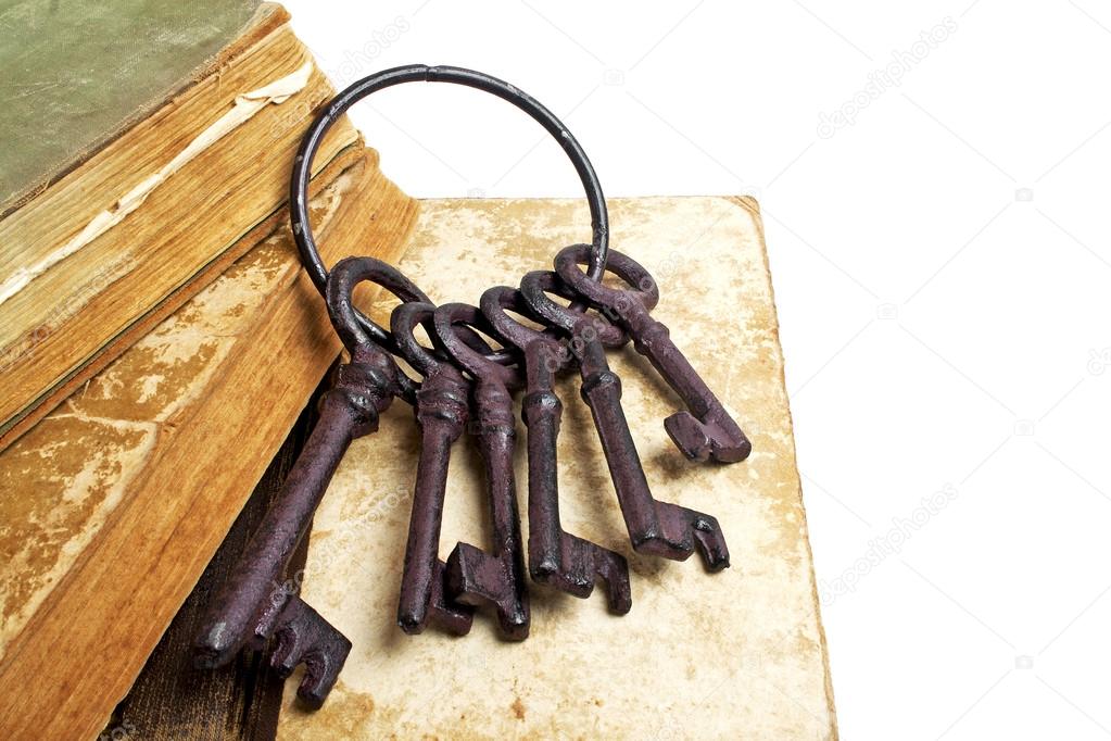 Vintage books and old keys on a white background Stock Photo by ...