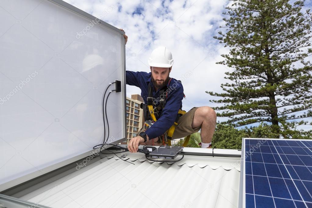 Solar panel technician — Stock Photo © zstockphotos #90735264