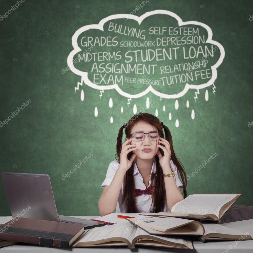 Frustrated schoolgirl thinking her problems — Stock Photo ...