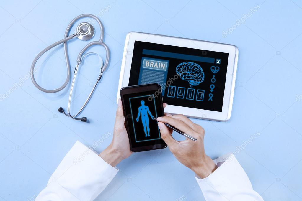 Physician with modern medical tools Stock Photo by ©realinemedia 55890757