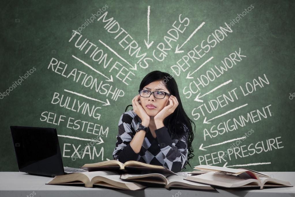 Schoolgirl having problems when studying — Stock Photo © realinemedia ...