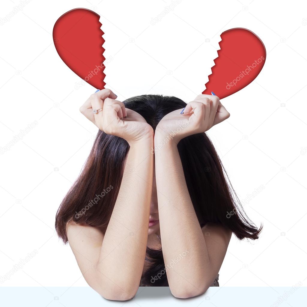 Sad teenage girl with broken heart — Stock Photo © realinemedia #68757313