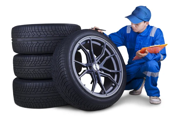 Checking tires Stock Photos, Royalty Free Checking tires Images ...