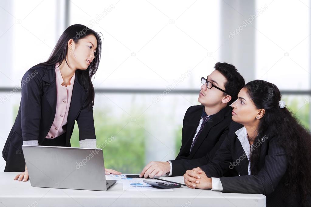 Female boss angry on her workers — Stock Photo © realinemedia #71951213