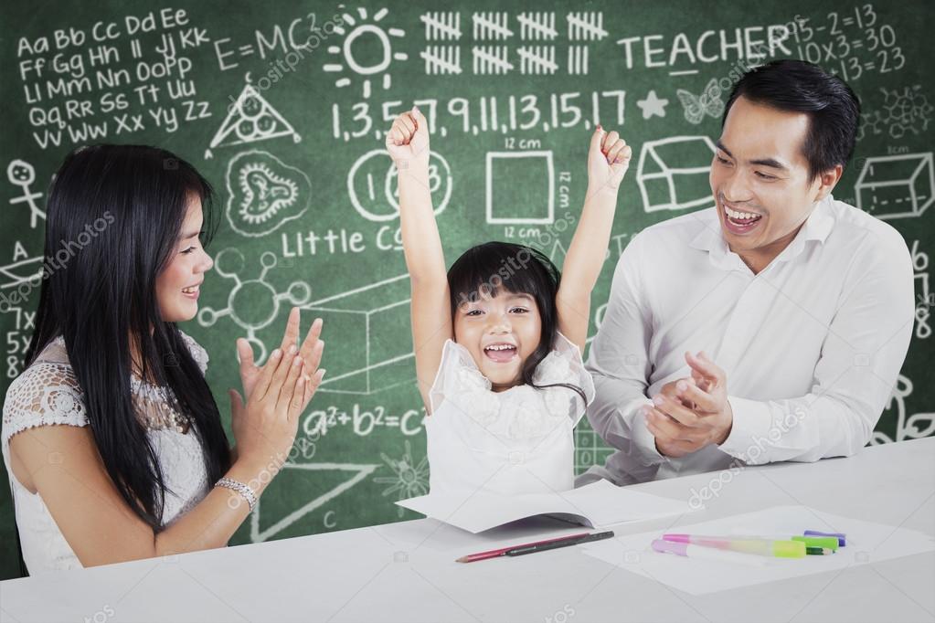 Proud parents giving applause on their child ⬇ Stock Photo, Image by ...