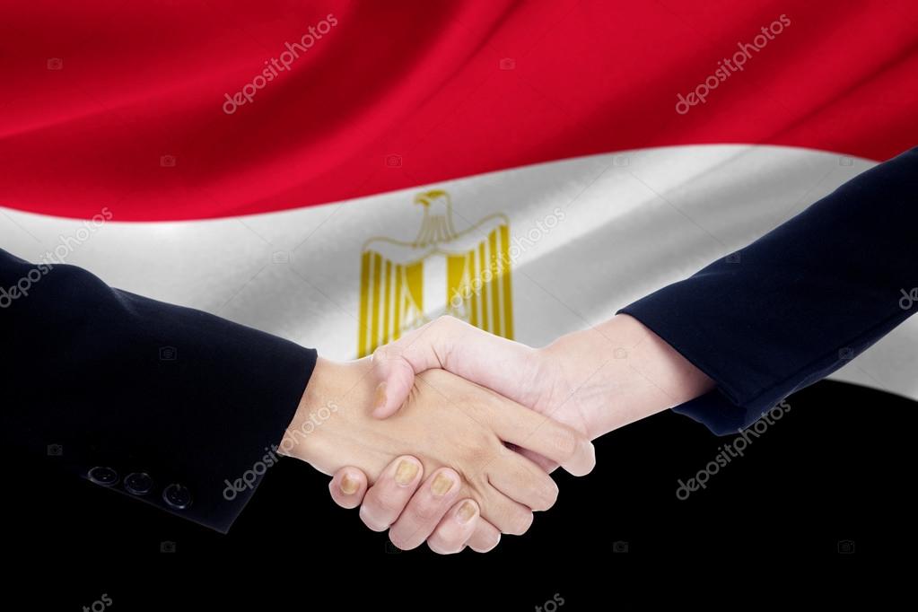 Handshake with flag of Egypt — Stock Photo © realinemedia #89322846