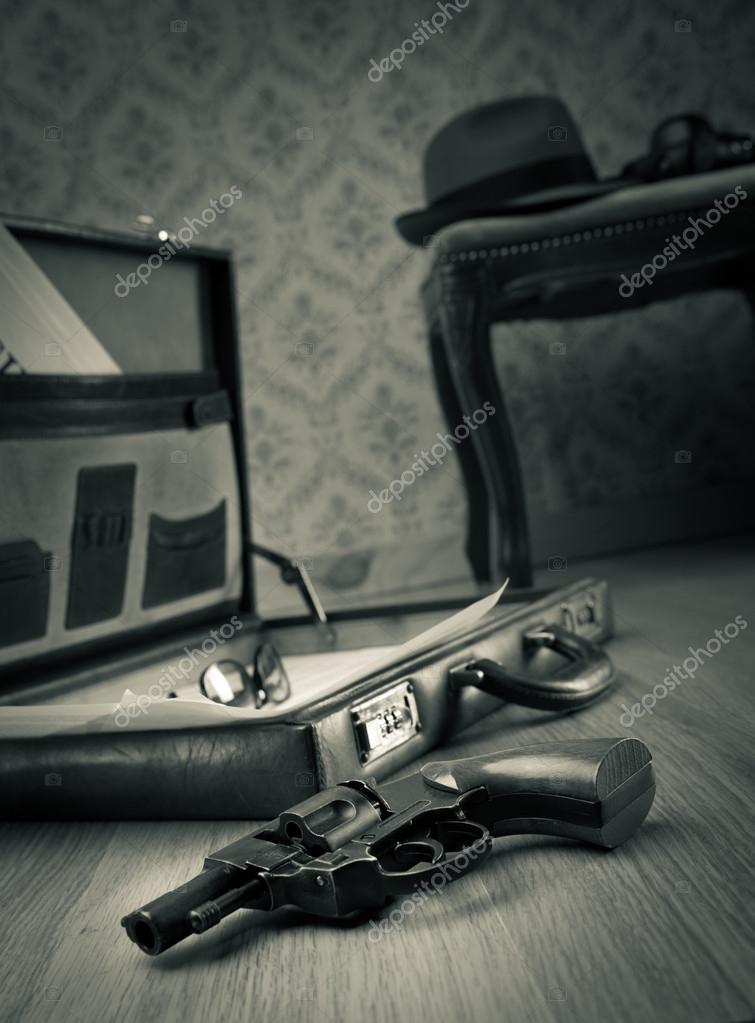 Detective briefcase on the floor Stock Photo by ©stokkete 55004821