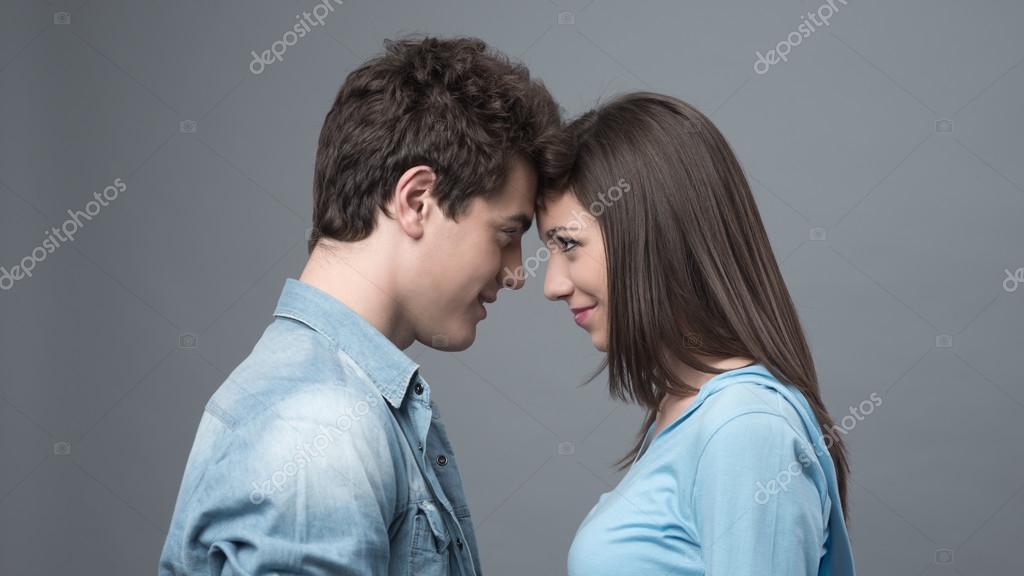 Couple touching foreheads Stock Photo by ©stokkete 66880409