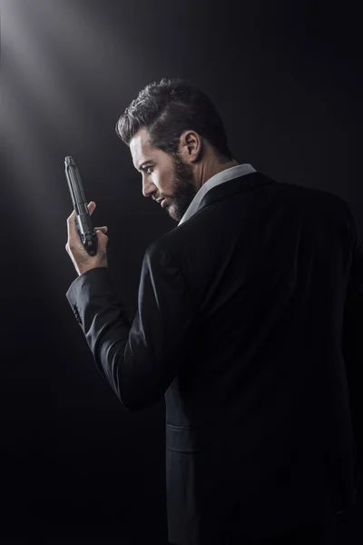 Man gun profile Pictures, Man gun profile Stock Photos & Images ...