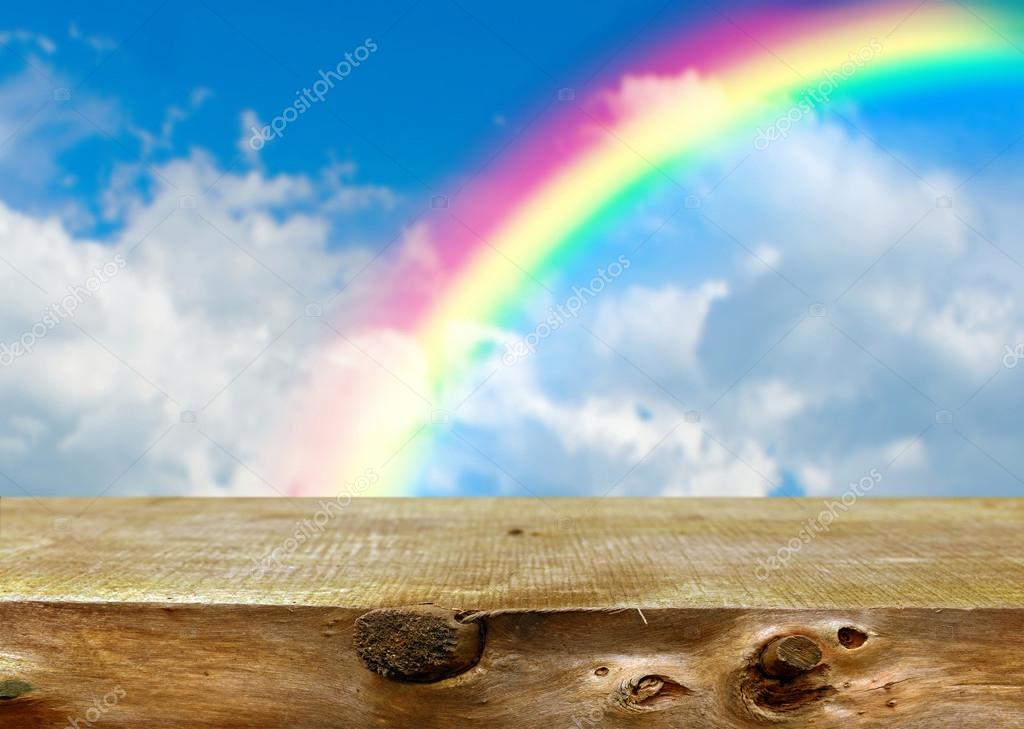 Empty table with rainbow Stock Photo by ©kwasny222 63177069