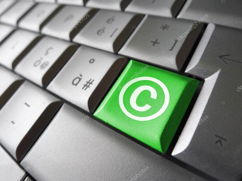 Copyright Symbol Computer Key — Stock Photo © NiroDesign #79231550