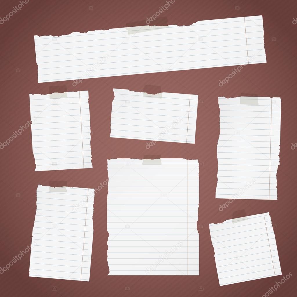 Pieces of torn white lined note paper with sticky tape on diagonal dark ...