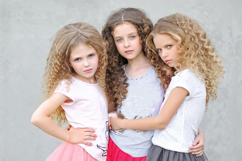 Portrait of three girlfriends on the nature — Stock Photo © zagorodnaya ...
