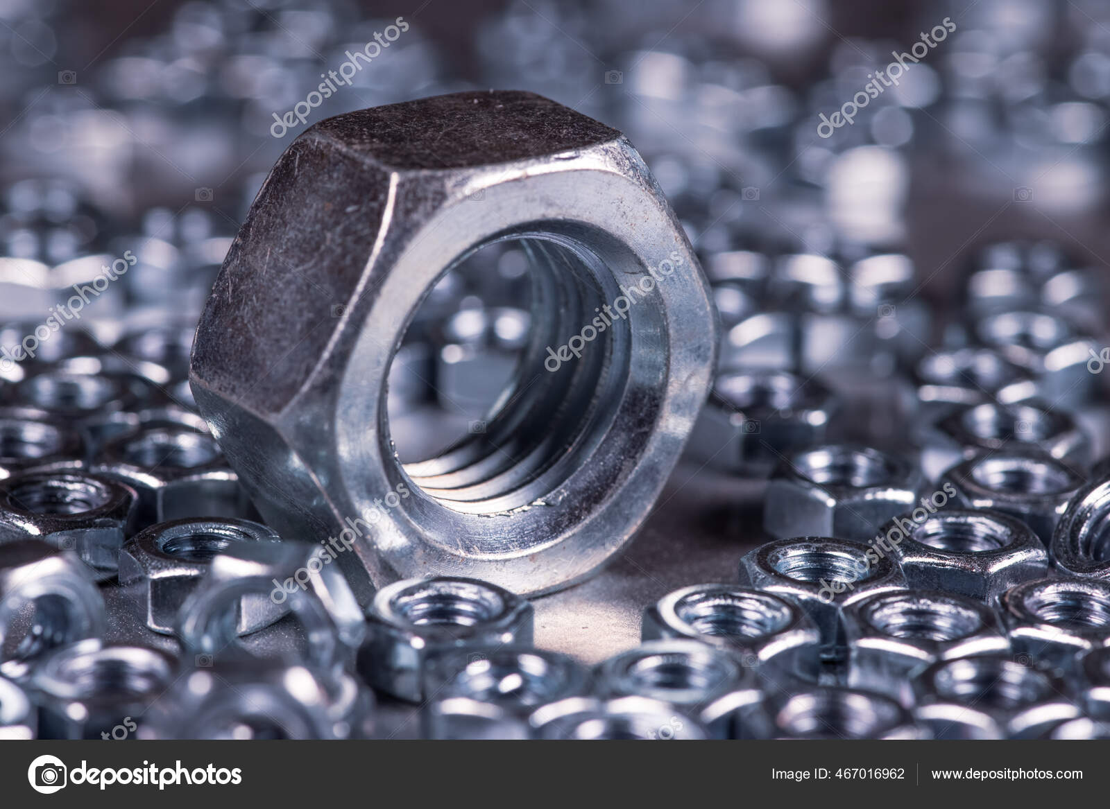 One big nut lies on a pile of small nuts — Stock Photo © YouraPechkin ...