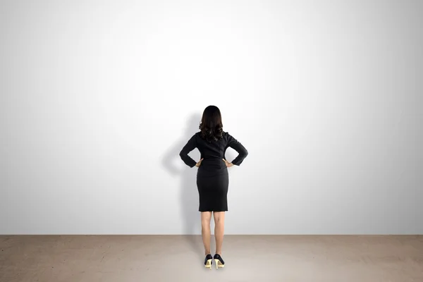 Standing facing wall Stock Photos, Royalty Free Standing facing wall ...