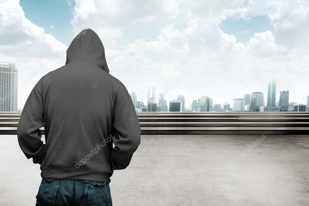 Faceless man in hood Stock Photo by ©leolintang 79571586