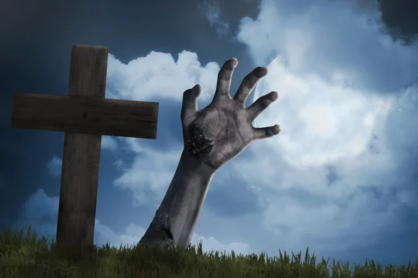 Zombie hand come out from ground - Stock Image - Everypixel